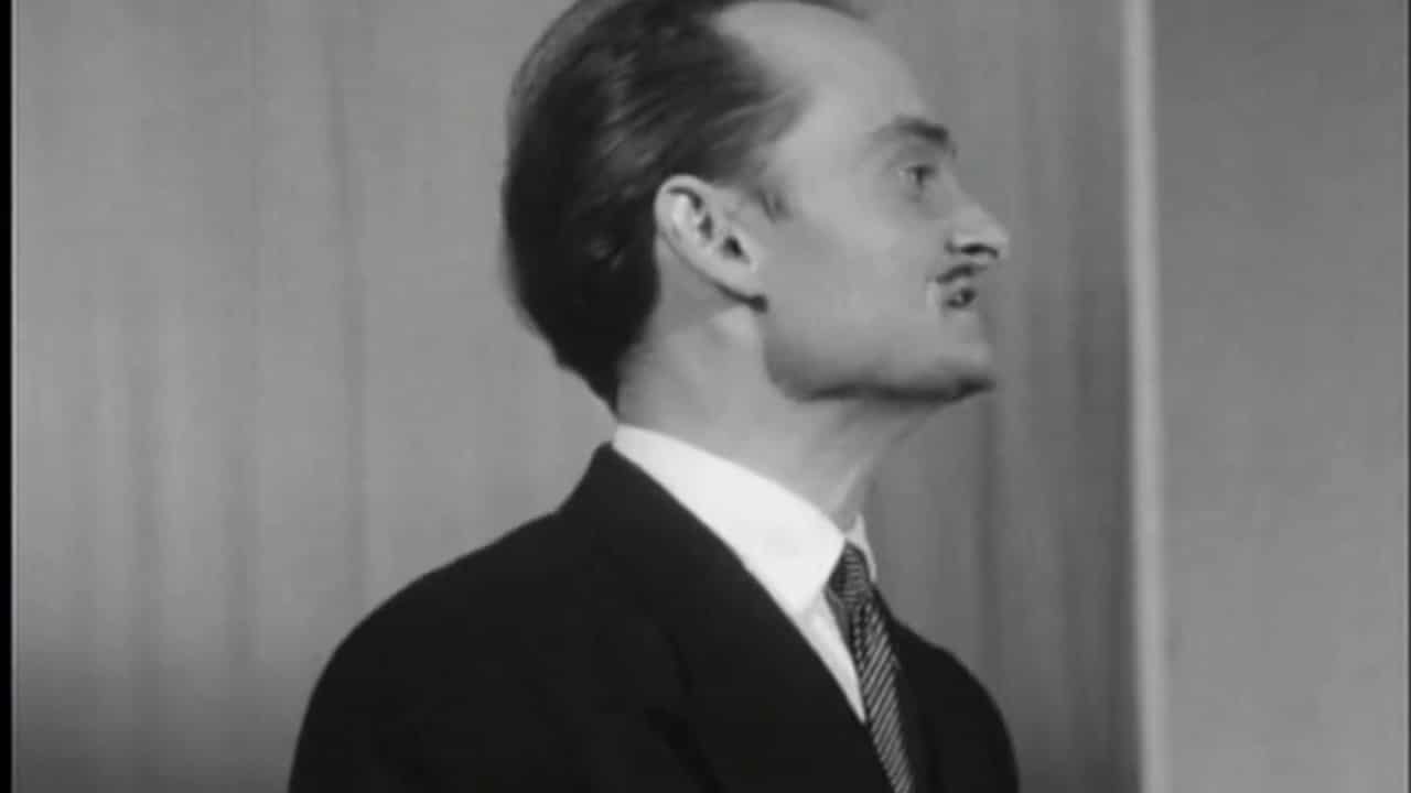 1956. SIM faisait ses grands débuts à la Télé. | Suis-Nous